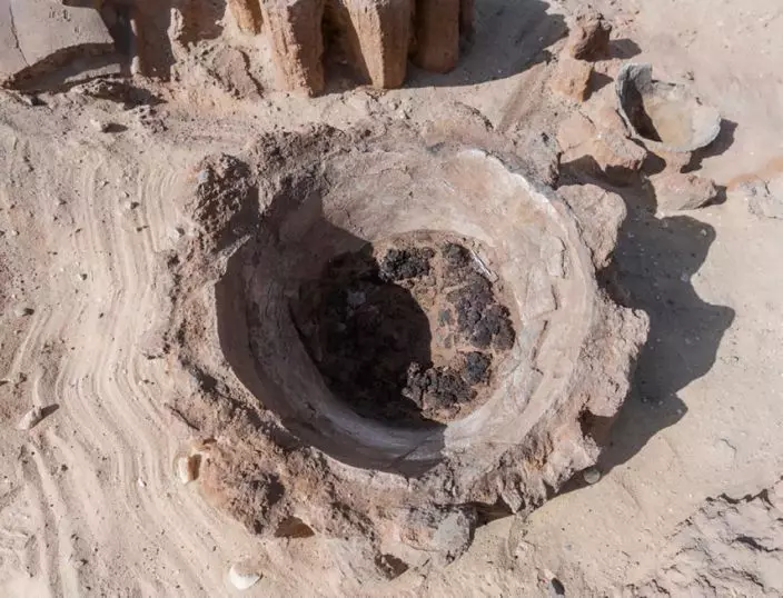 This pottery basin was used to heat up a mixture of grains and water to produce beer in what archaeologists believe to be the oldest known beer brewery. Photo courtesy of the Supreme Council of Antiquities, Egyptian Antiquities Ministry.