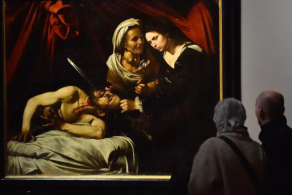 De Michelangelo Merisi da Caravaggio Judith huet Holofernes gekäppt. Foto: GIUSEPPE CACACE/AFP/Getty Images.