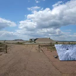 Anya Gallaccio, Untitled landscapes, 2014. Photol Owain Thomas, courtesy SNAP Art at Aldeburgh Festival Kemiso ea lifoto e susumelitsoeng ke naha e ka holimo eo RAF e entseng liteko tsa pele ka sefofaneng.