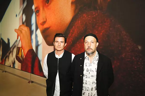 Orlando Bloom and Stefan Simchowitz pose during the 