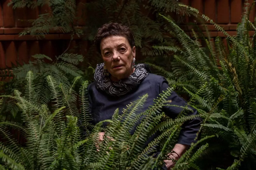 Mexican photographer Graciela Iturbide poses for a picture at her studio designed by Mexican architect Mauricio Rocha in Mexico City, on October 22, 2021. Photo by PEDRO PARDO /AFP via Getty Images.