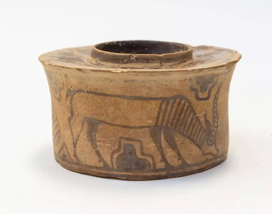 An unsuspecting auction house employee was using this 4,000-year-old pot as a toothbrush holder until he spotted some similarly looking antiquities at work and had the piece examine by an expert. Photo courtesy of Hansons Auctioneers.