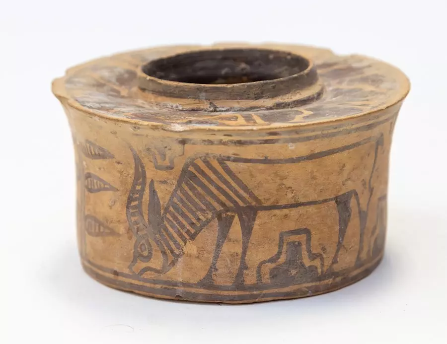 An unsuspecting auction house employee was using this 4,000-year-old pot as a toothbrush holder until he spotted some similarly looking antiquities at work and had the piece examine by an expert. Photo courtesy of Hansons Auctioneers.